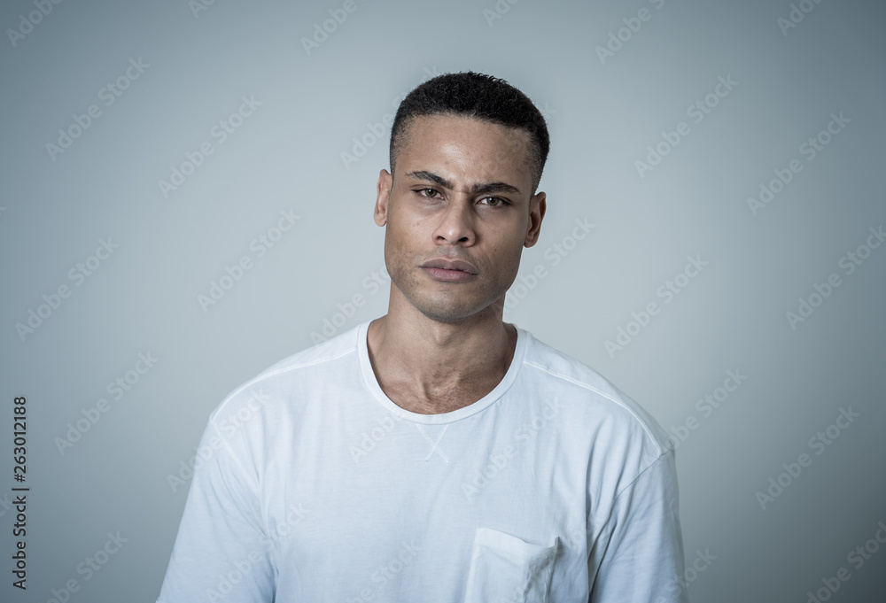 Human expressions and emotions. Young attractive man with an angry face ...