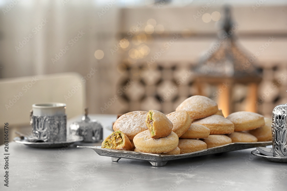 Traditional Islamic cookies on table, space for text. Eid Mubarak Stock ...