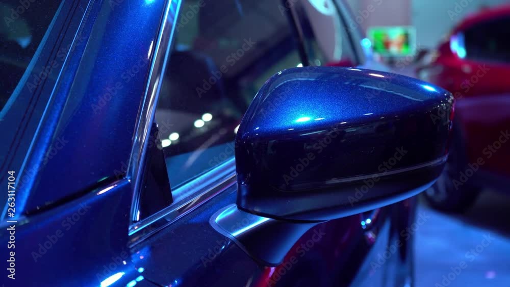 side mirror of the car. car showroom. cars sale. vehicle. smart mirrors ...