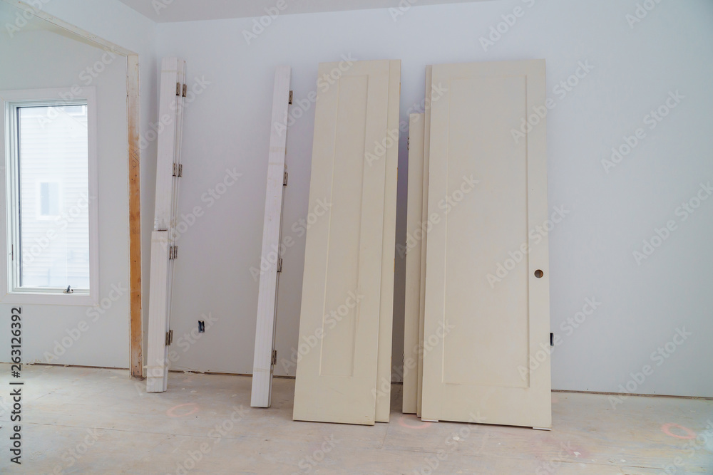 Interior construction of housing project with drywall installed door ...