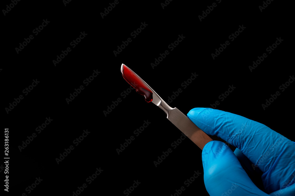 Surgical instruments in operating room and doctor performing surgery ...