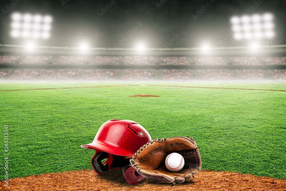 Baseball Glove, Ball, and Helmet on Field in Outdoor Stadium With Copy ...