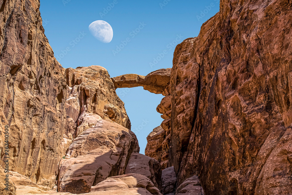 Burdah Rock Bridge in incredible lunar landscape in Wadi Rum in the ...