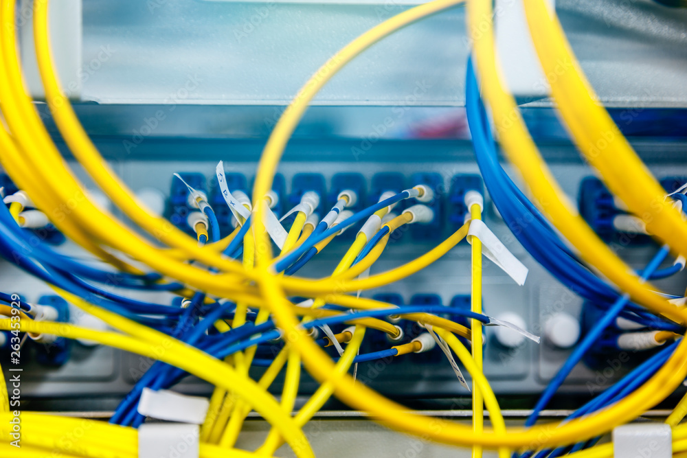 Network hub and patch UTP LAN cables in rack cabinet, close up Stock ...