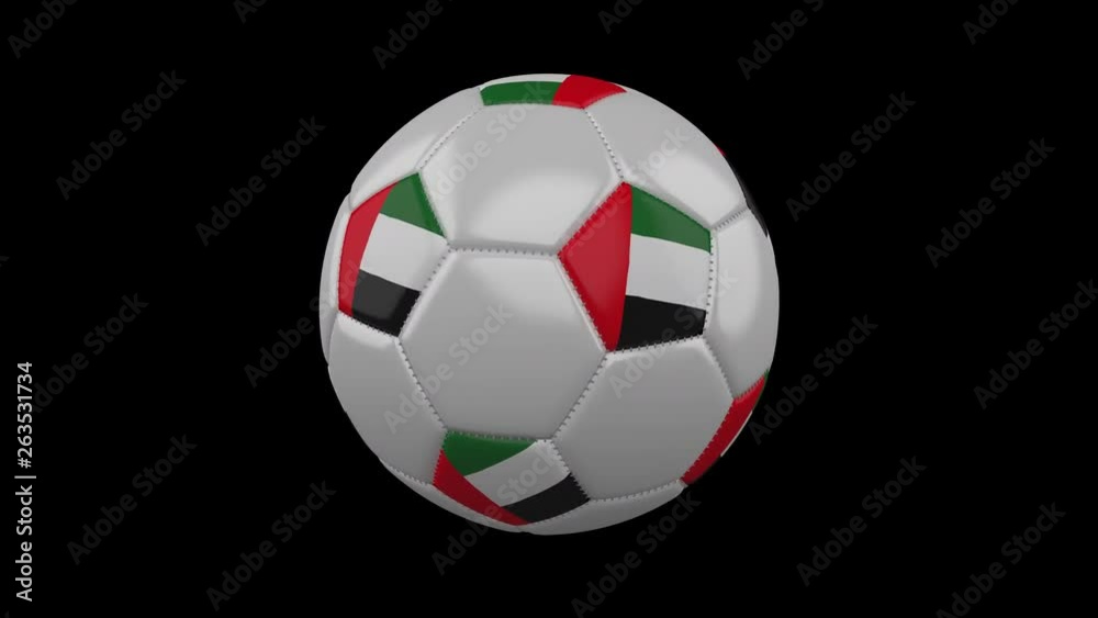 Soccer ball with the flag of United Arab Emirates colors rotates on ...