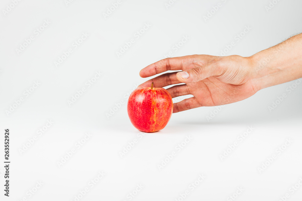 Hand Reaching For Apple