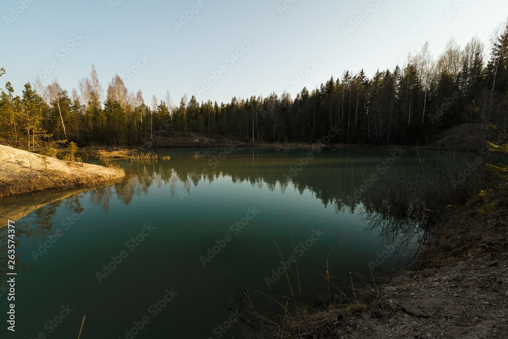 Beautiful turquoise lake in Latvia - Meditirenian style colors in ...
