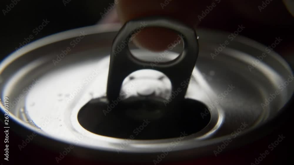 top view of white man open red can of soda or beer. unhealthy eating ...