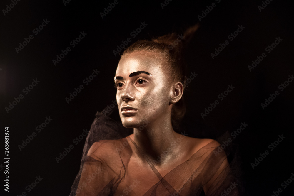 Human statue with metallic gold body paint Stock Photo | Adobe Stock