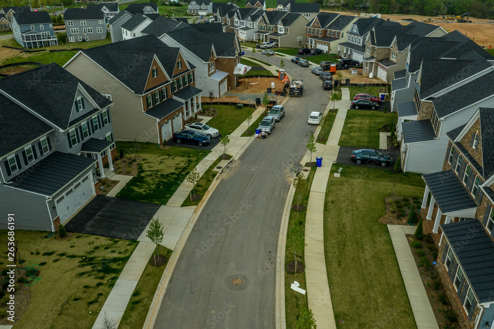 Aerial view of typical American new construction neighborhood street in Maryland for the upper ...