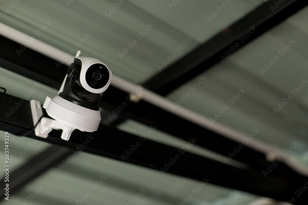 Security CCTV camera surveillance system outdoor of house. A blurred ...