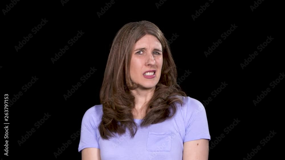 Woman's facial expression as she cringes and reacts to a fail Stock ...