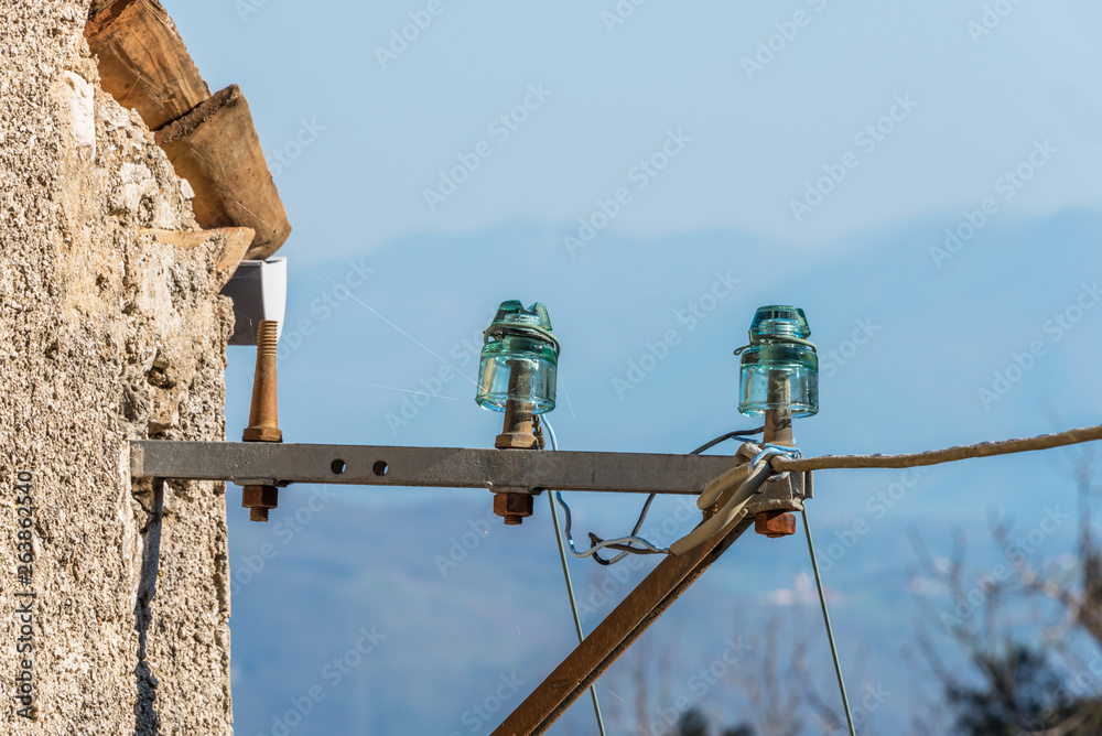 Antique Green Glass Electric Insulators in an Abandoned Village in ...
