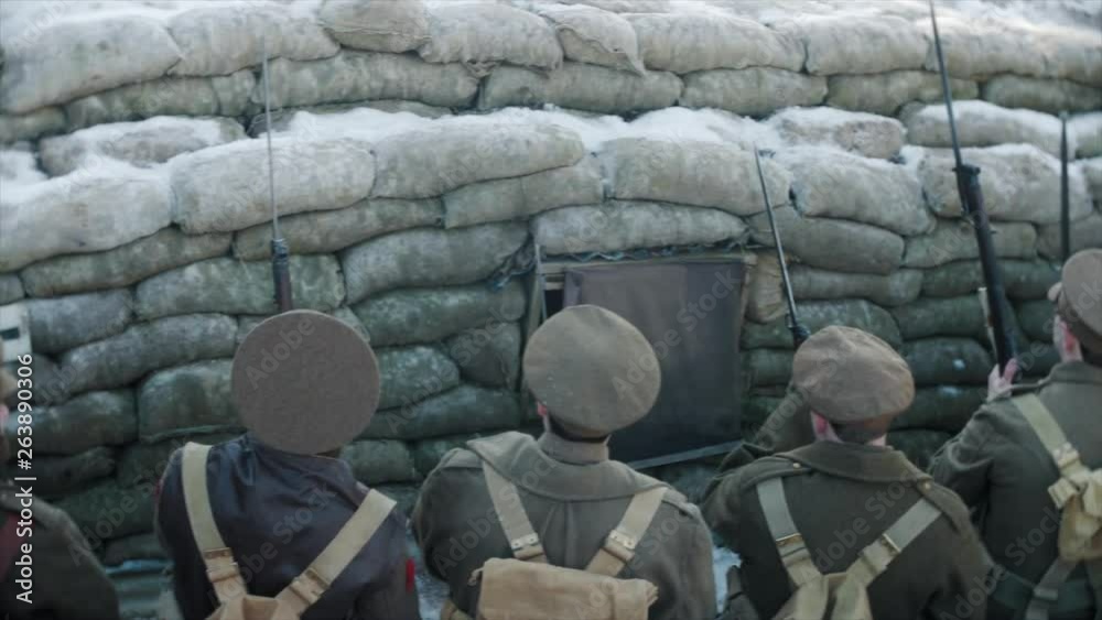 British World War One soldiers prepare to go over the top of the trench to attach the German ...
