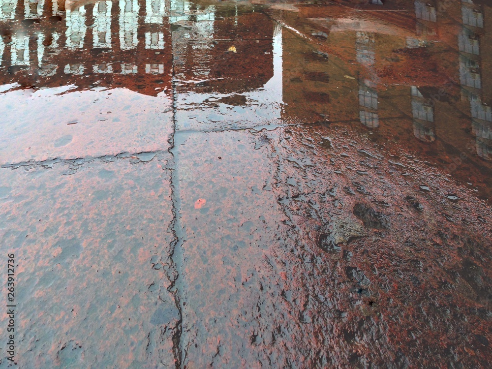 reflection in the water visible buildings during the morning rain Stock ...