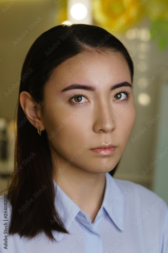 Microbleeding and eyebrow architecture. Girl after beauty procedure in ...