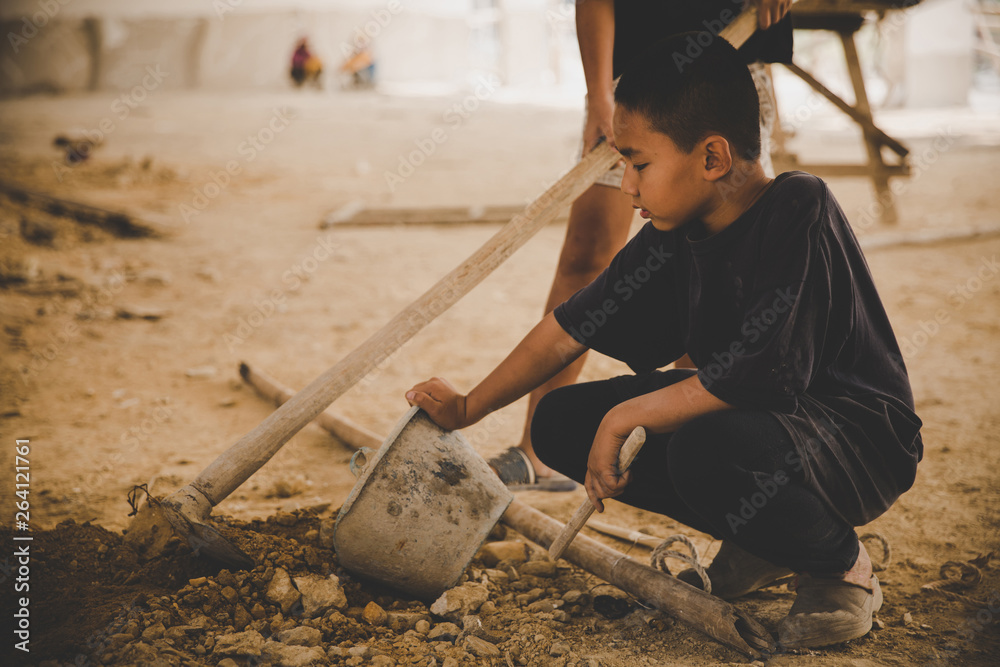 Little Child labor working in commercial building structure, World Day ...