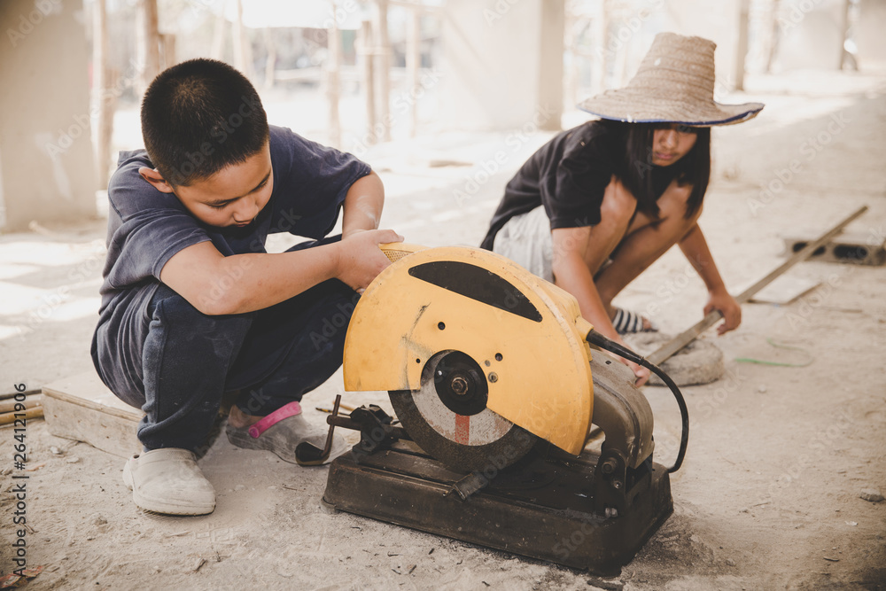 Little boys and girls labor working in commercial building structure ...