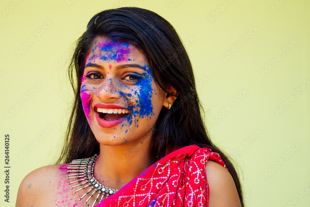 Holi Festival Of Colours. Portrait of happy indian girl in traditional ...