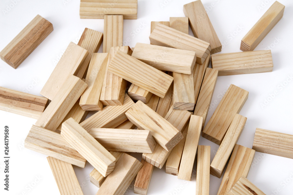 Wooden rectangles arranged differently over a white background. Copy ...