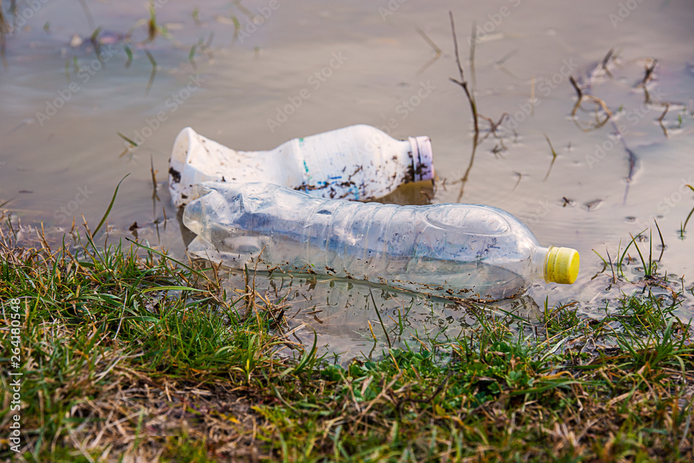 Garbage in the river Stock Photo | Adobe Stock