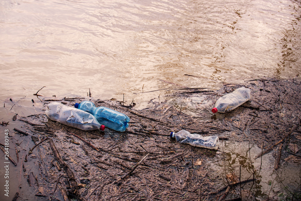Garbage in the river Stock Photo | Adobe Stock