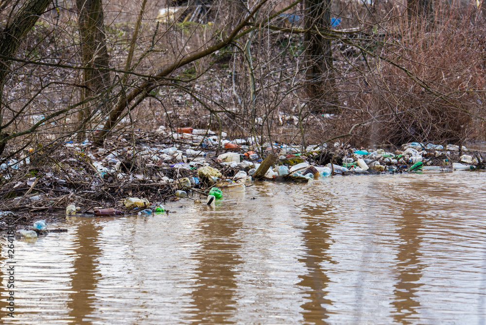 Garbage in the river Stock Photo | Adobe Stock