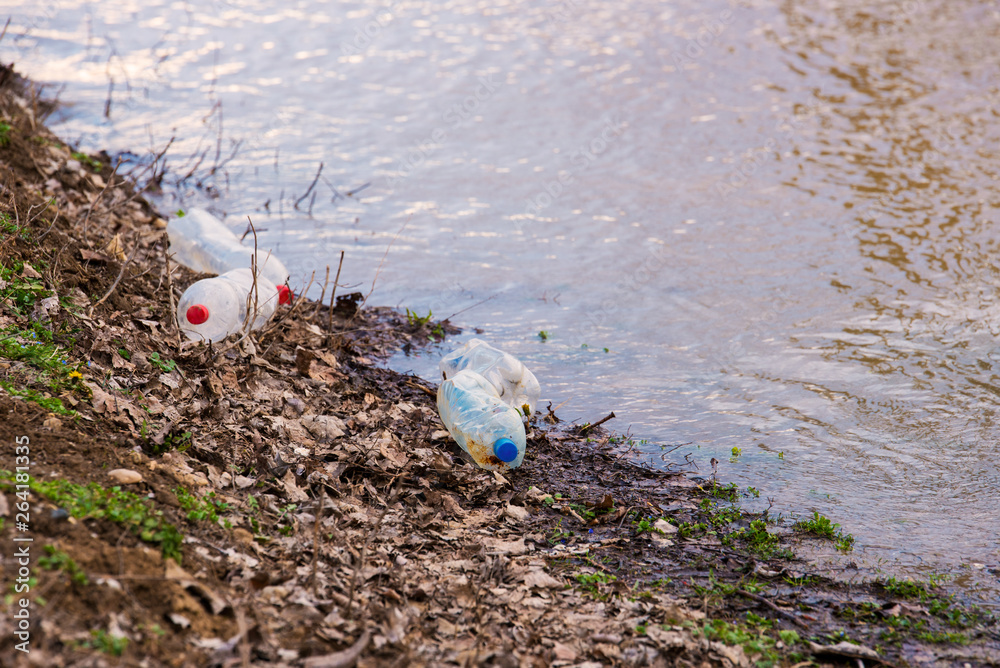 Garbage in the river Stock Photo | Adobe Stock