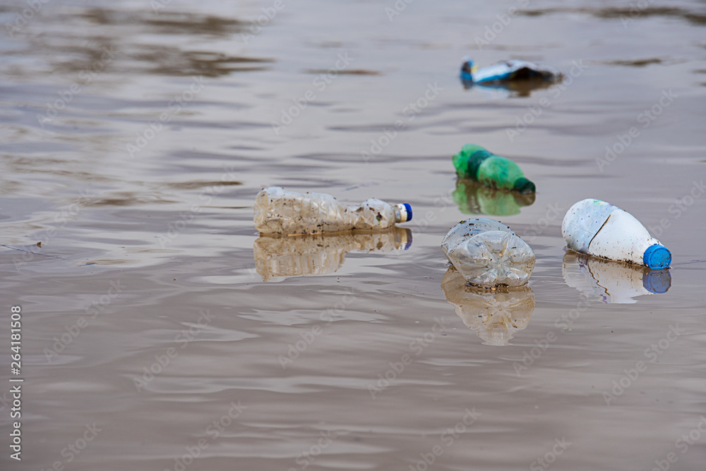 Garbage in the river Stock Photo | Adobe Stock