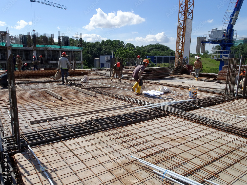 Floor slab and beam reinforcement bar under fabrication at the ...