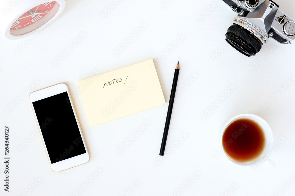 White office photography desk table with laptop, tablet, camera and ...