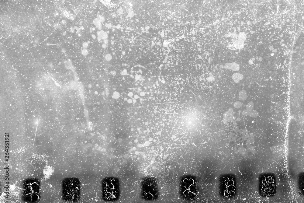 Blank grained and scratched film strip texture background. old film ...