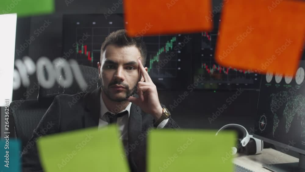 teamwork in modern office, man manager look at the board with sticky ...