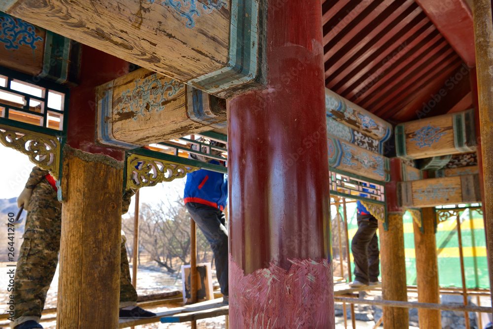 Details of pillars and wooden structure of an old Buddhist temple being ...