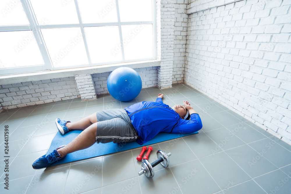 Fat man, he is tired and discouraged From exercise Stock Photo | Adobe ...