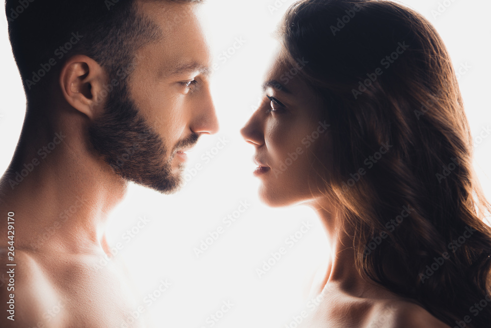 Side view of couple looking at each other isolated on white Stock Photo ...