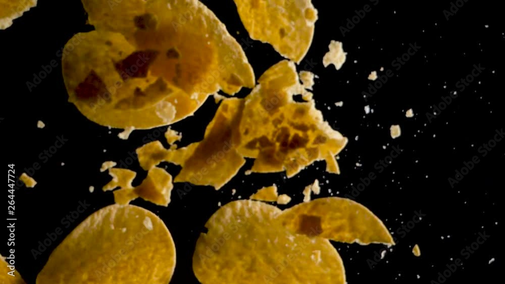 Vidéo Stock Crips, potato chips falling on the ground and cracking in ...