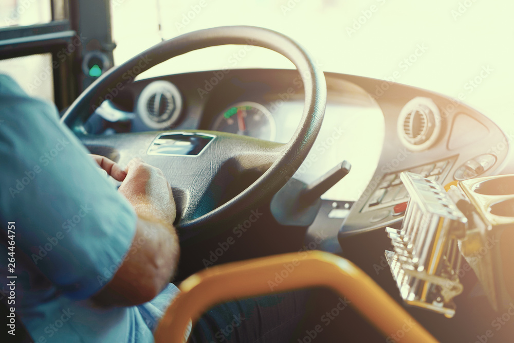 Hands of driver in a modern bus by driving. Concept of bus driver ...
