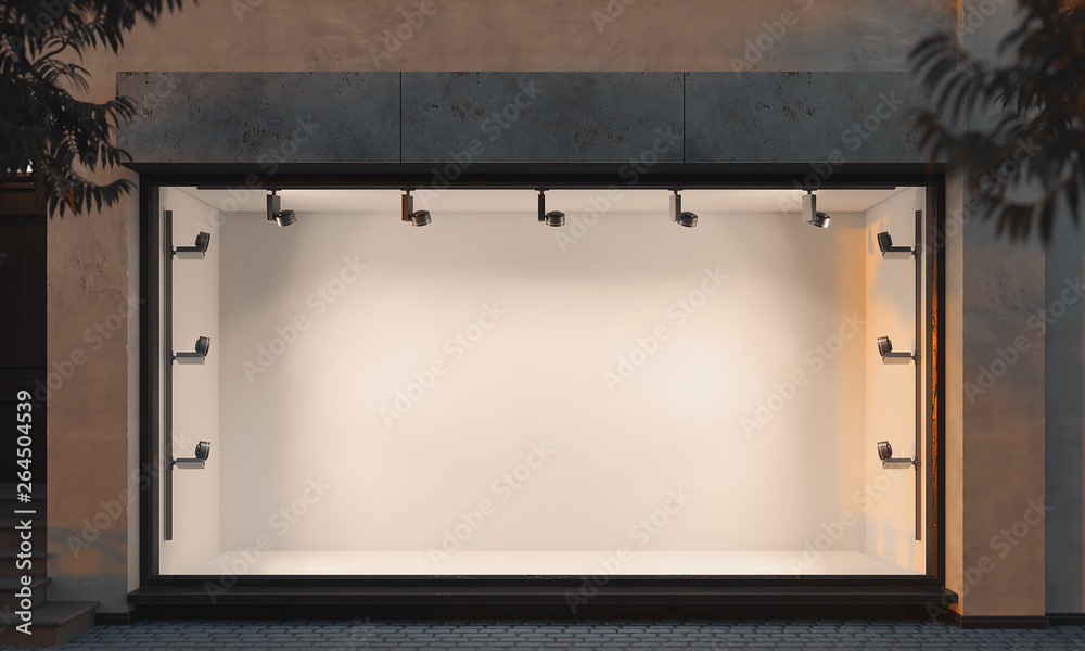 Empty illuminated storefront. night time. 3d rendering. Copy space ...