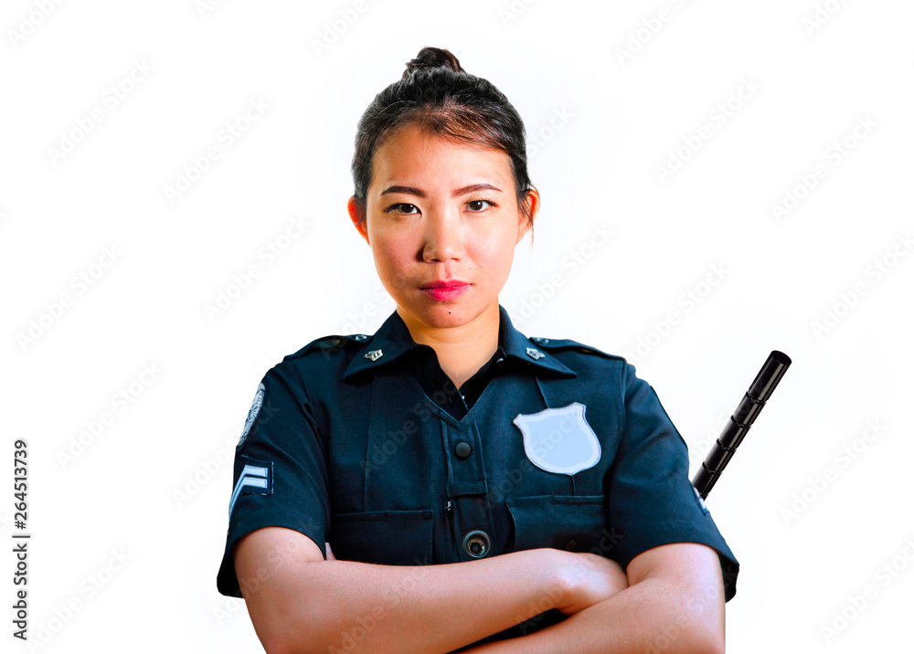 young attractive and defiant Asian Chinese police officer in uniform ...