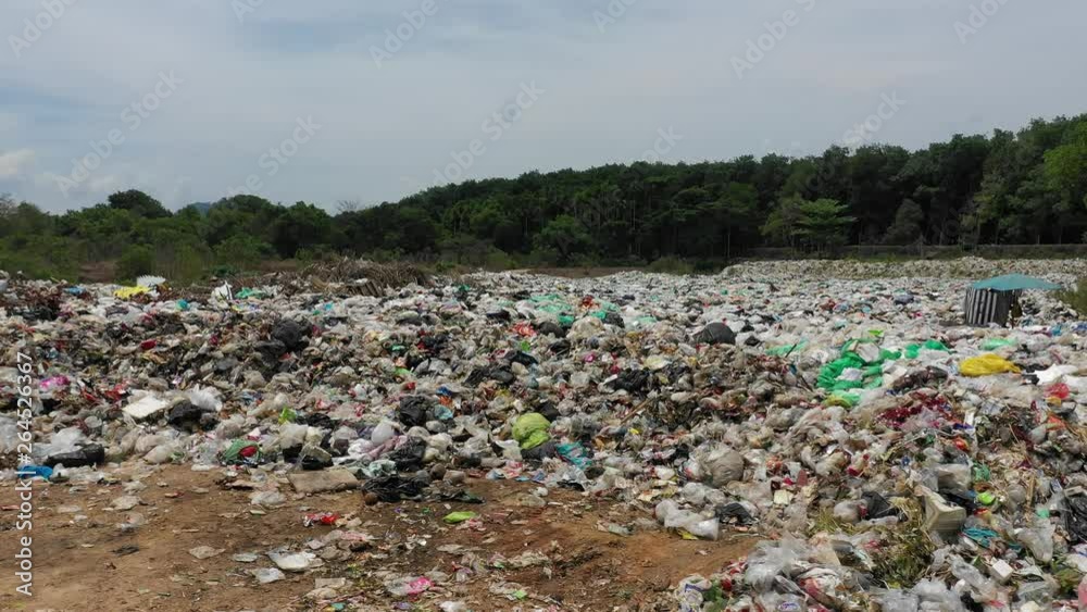 Plastic pollution environmental problem. A landfill in Southeast Asia ...