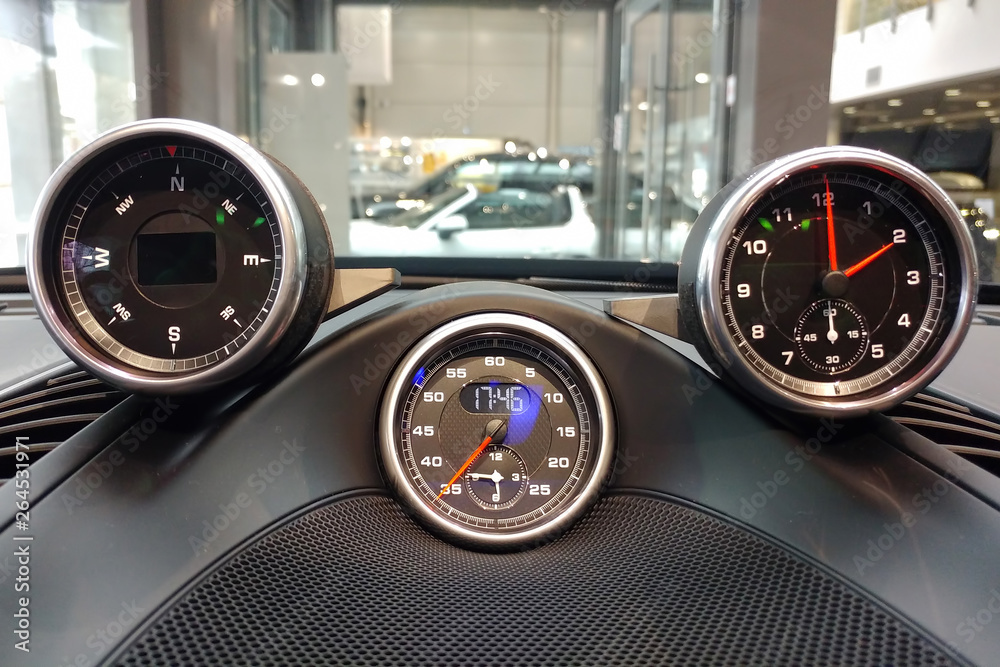 Interior details of a sports car. Sports chronometer with electronic ...