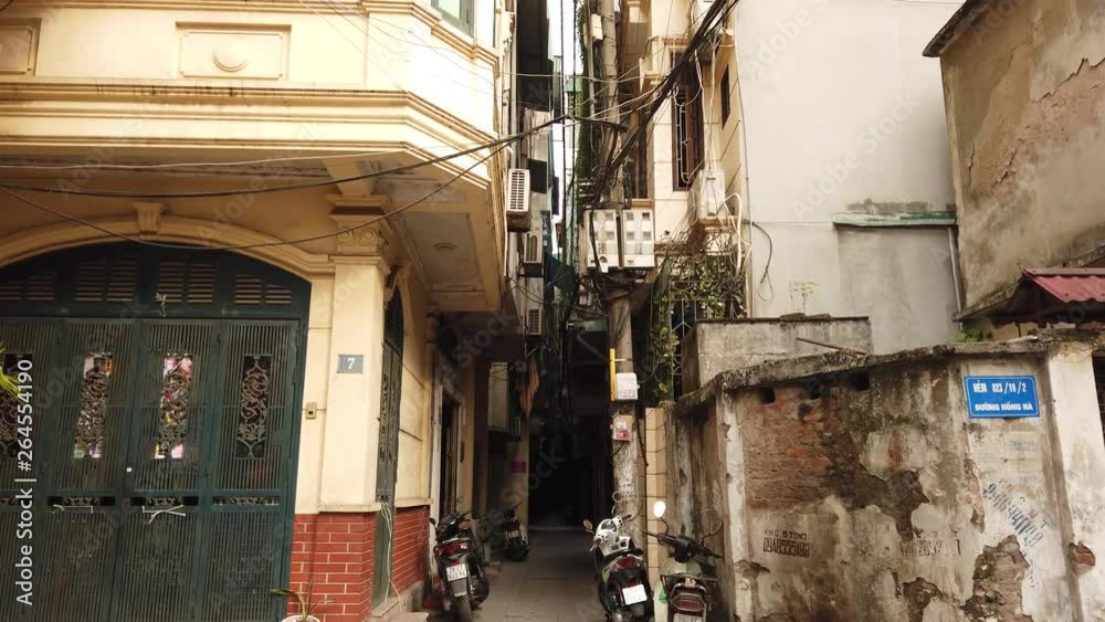Old historic narrow street Vietnam. Slums abandoned poverty. French ...
