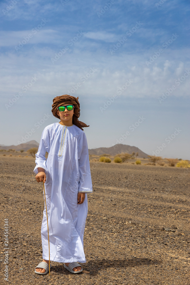 Traditional Arabic boy. Culture heritage in modern world. Stock Photo ...