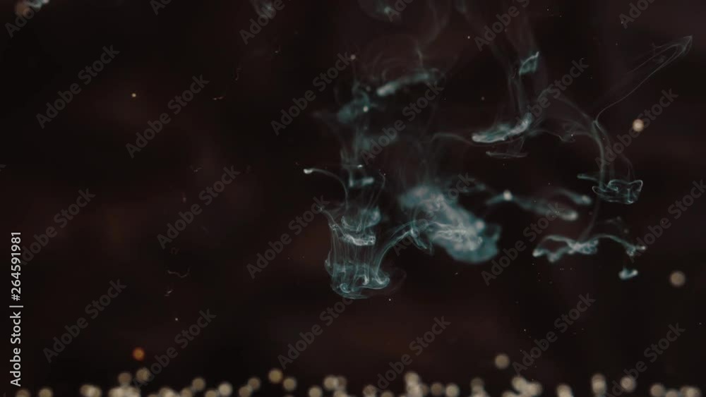 White Ink Effect In Water Filmed On Black Background. Abstract ink ...