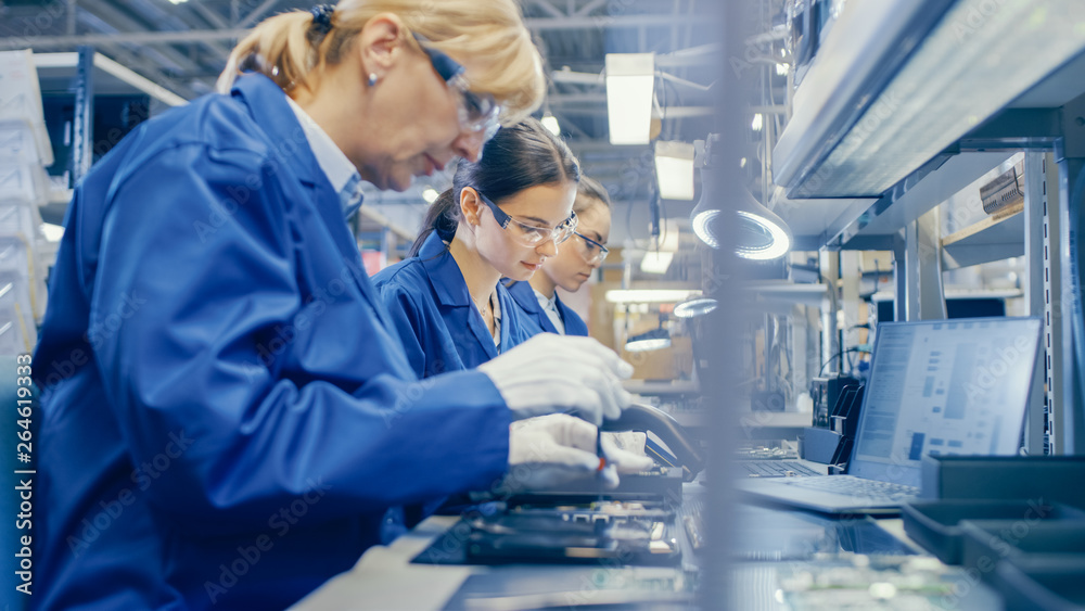 Female Electronics Factory Worker in Blue Work Coat and Protective ...
