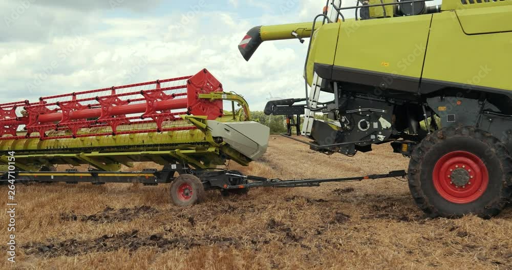 Combine Harvester Carries The Reaper To The Farm Base In A Special ...