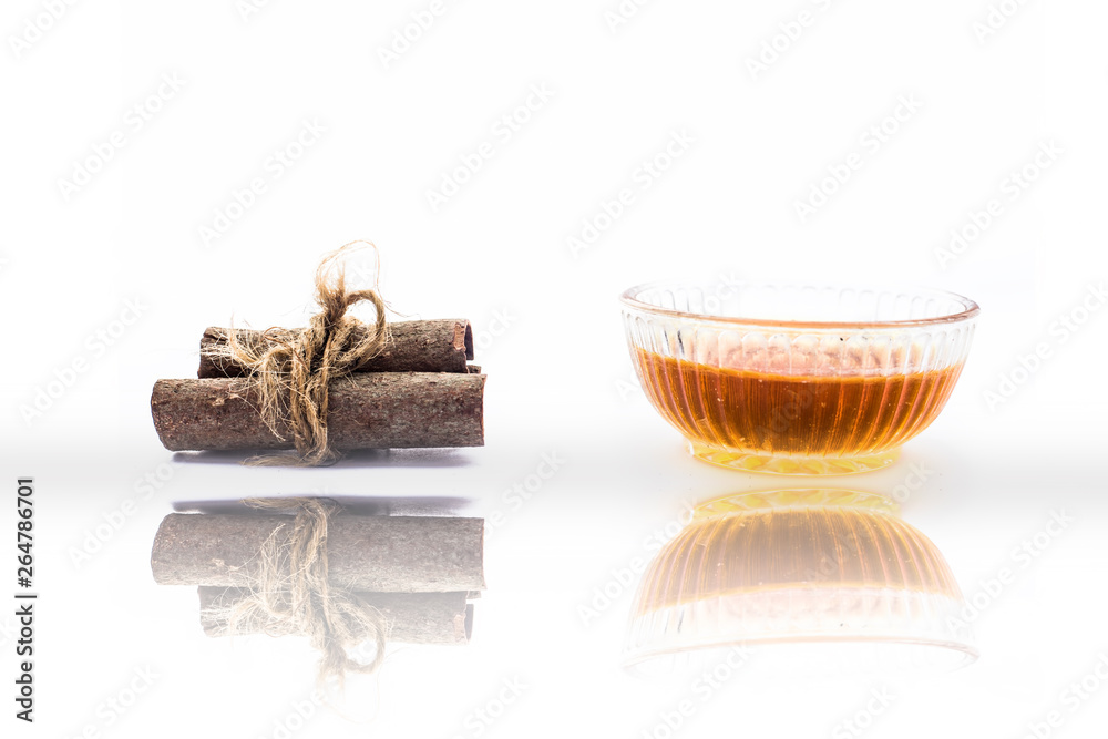 Cinnamon face pack isolated on white i.e. Cinnamon or tej powder well ...