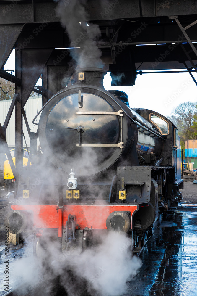 Class B1 Steam Engine. waiting under the coal hopper on a heritage rail ...