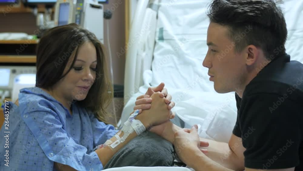 Woman In Labor Holds Husbands Hands As They Breathe. Husband and wife ...